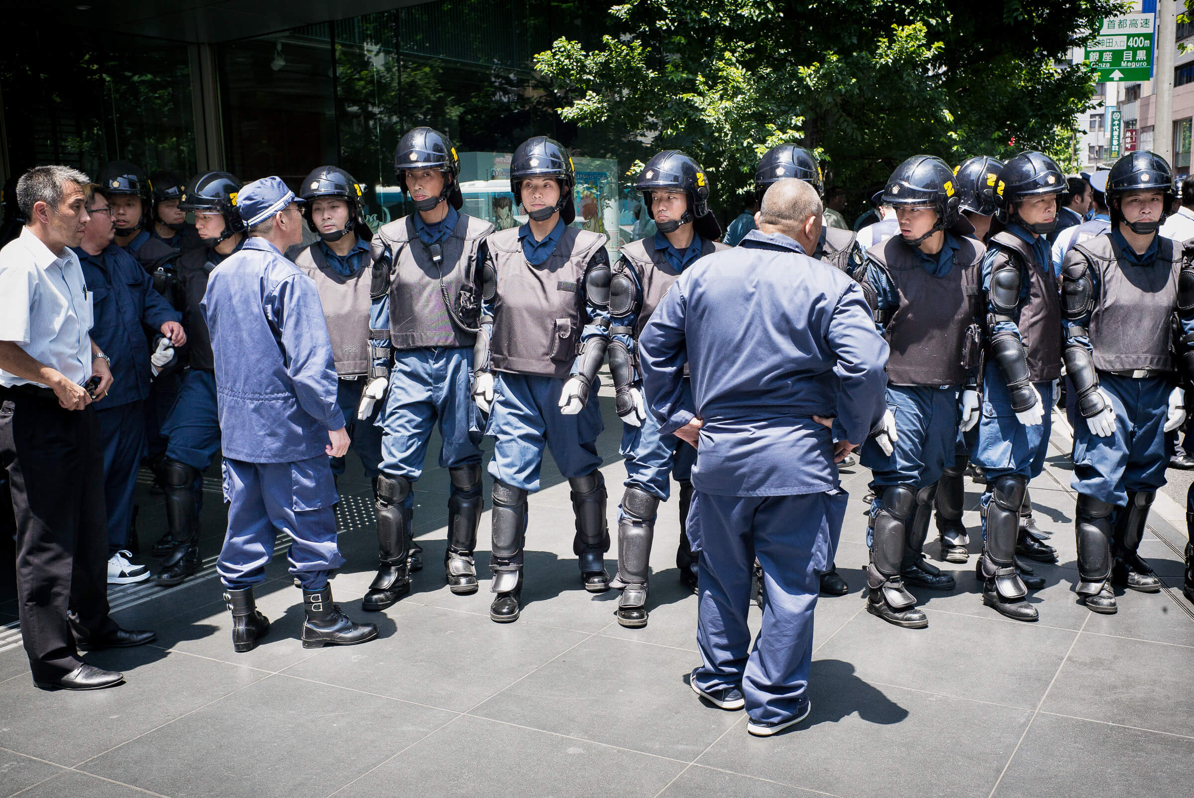 Japanese far-right nationalists and the police in comedy confrontations ...